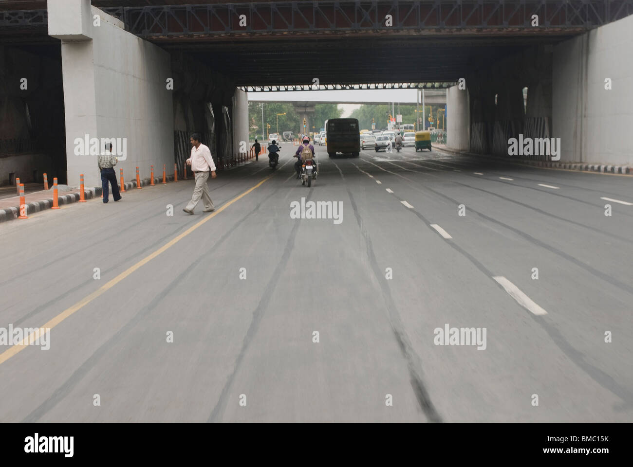 Vehicles passing through an underpass, New Delhi, India Stock Photo - Alamy