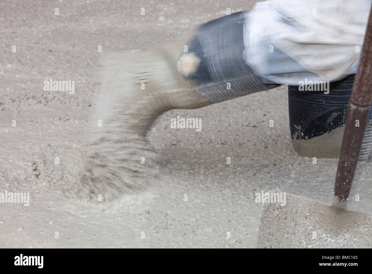 Pouring concrete for the floor of a house extension, Ambleside, UK ...