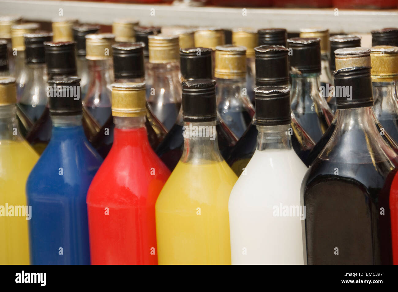 Close-up of sweet syrup bottles Stock Photo - Alamy