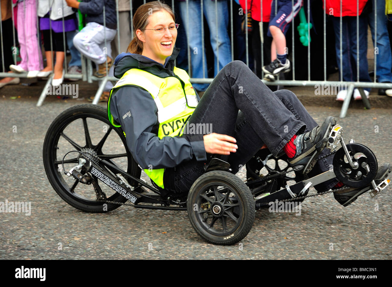 Luton Carnival Cyclist on a recumbent bike 2010 Stock Photo - Alamy