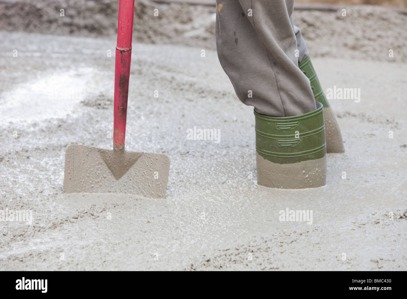 Pouring concrete for the floor of a house extension, Ambleside, UK ...