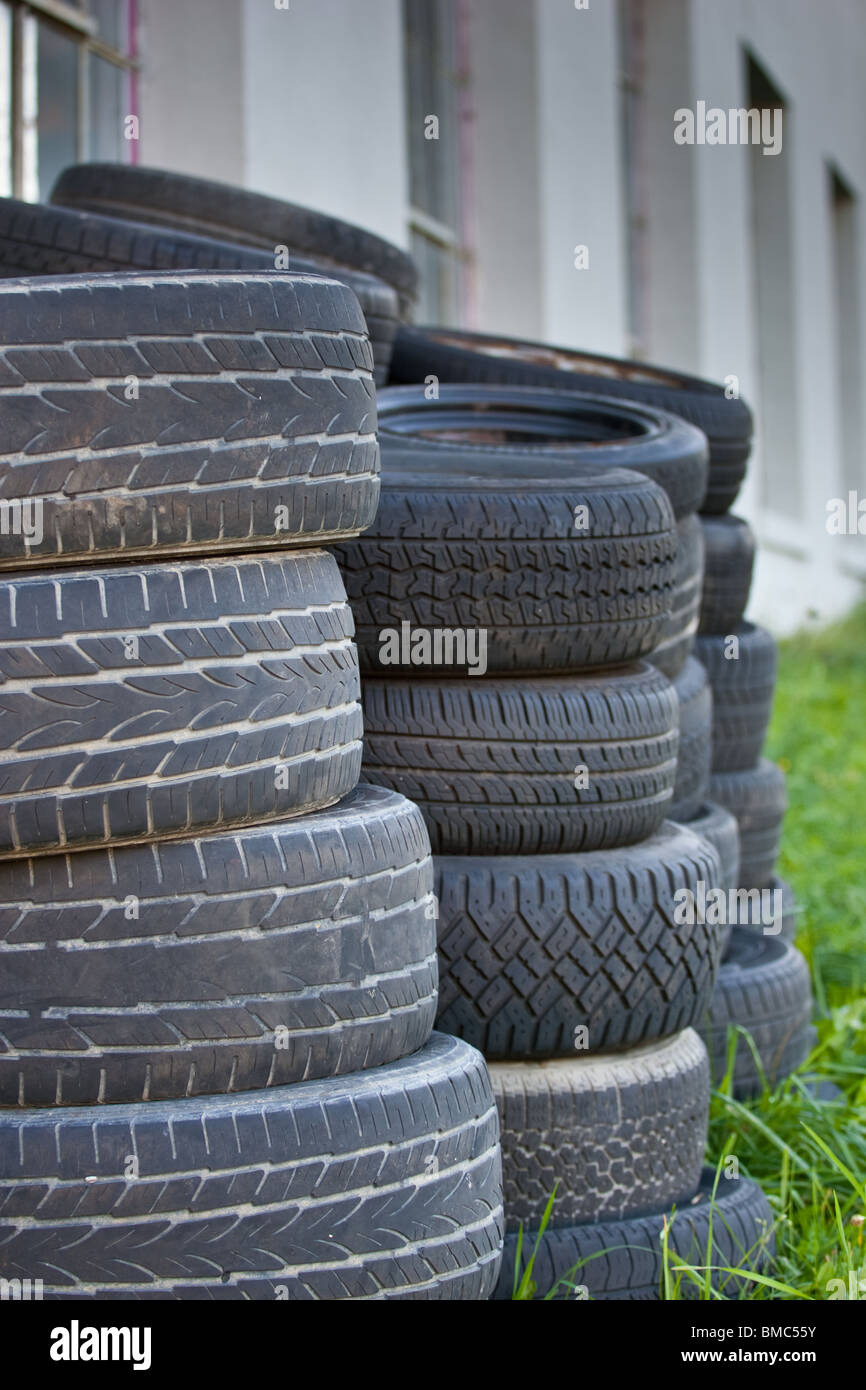 A bunch of used stacked tires Stock Photo - Alamy