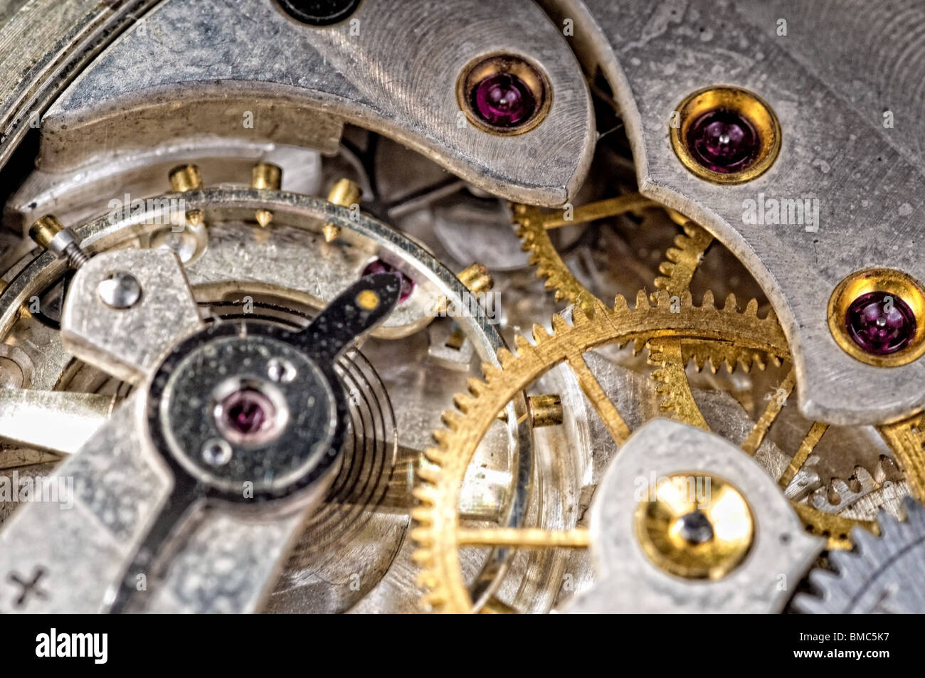 Closeup of the interlocking gears Stock Photo - Alamy