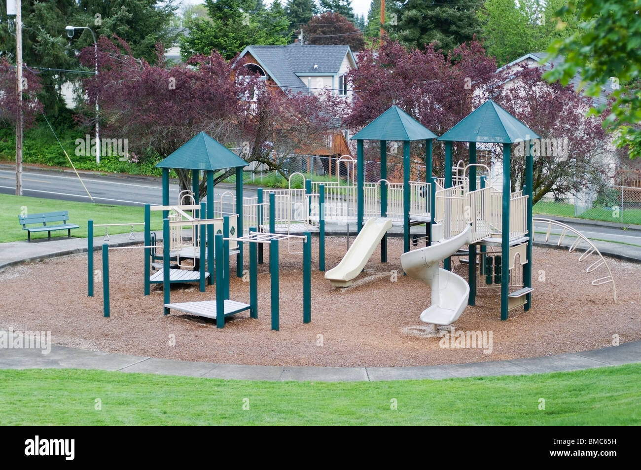 Modern play structure in new community neighborhood park Stock Photo ...