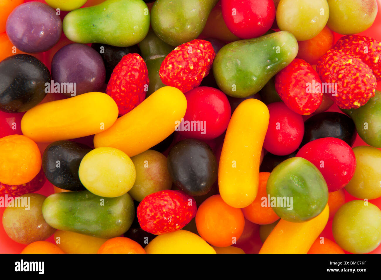 Colorful candy in fruit shape as a background Stock Photo - Alamy