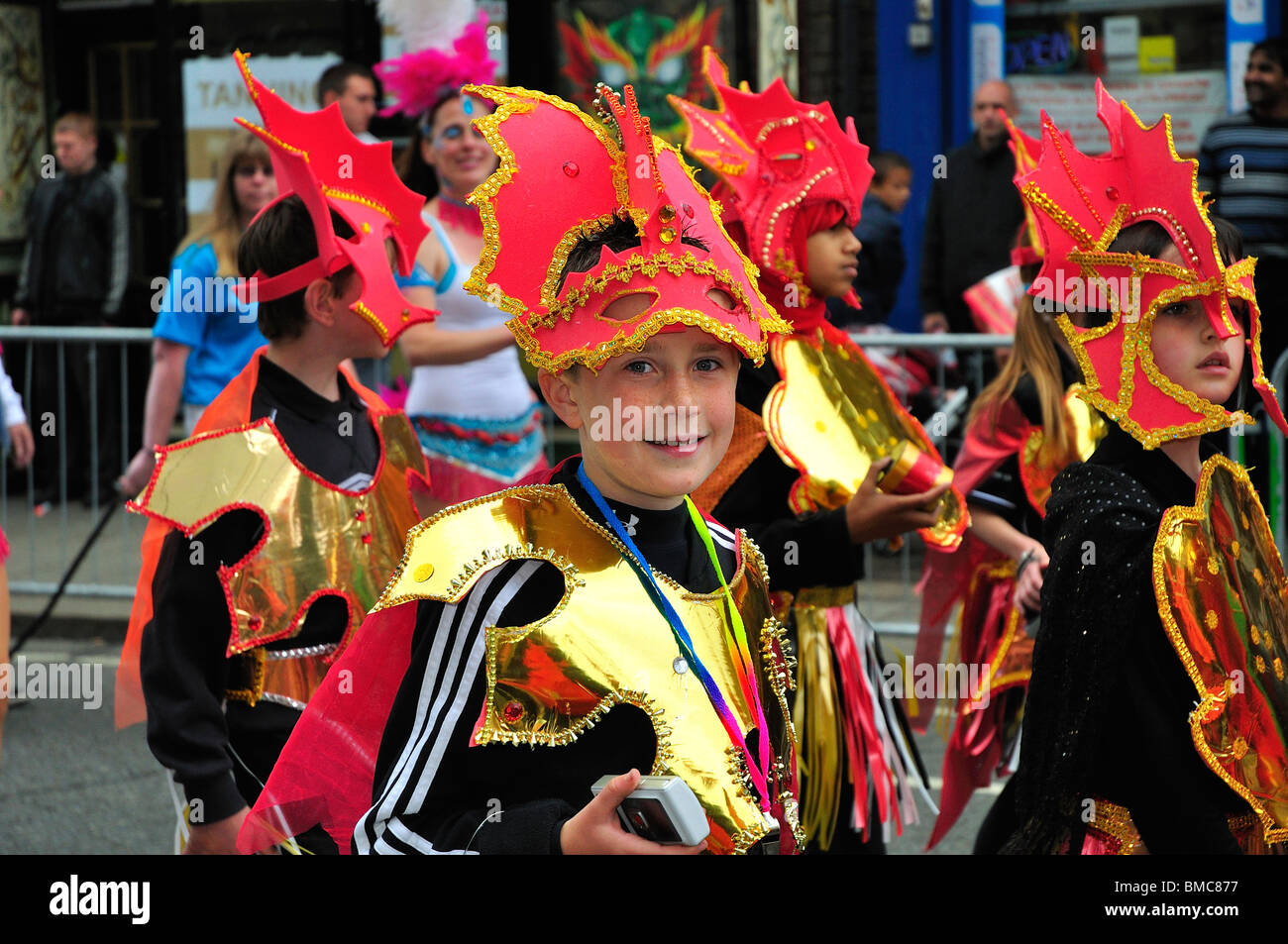 Luton Carnival, school children in colourful costumes Stock Photo - Alamy