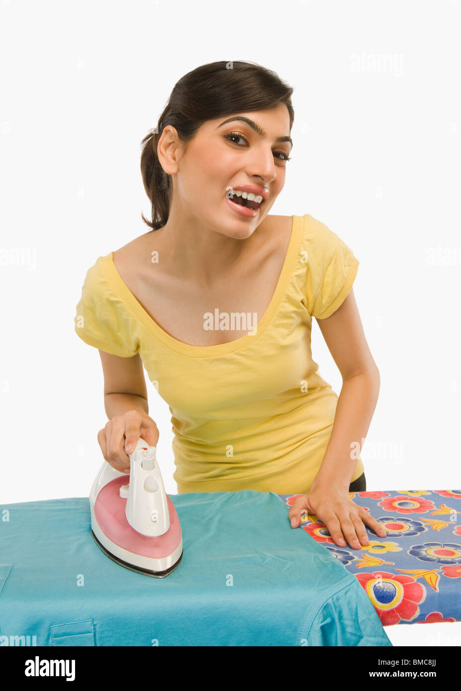 Portrait woman holding steam iron hi-res stock photography and images ...