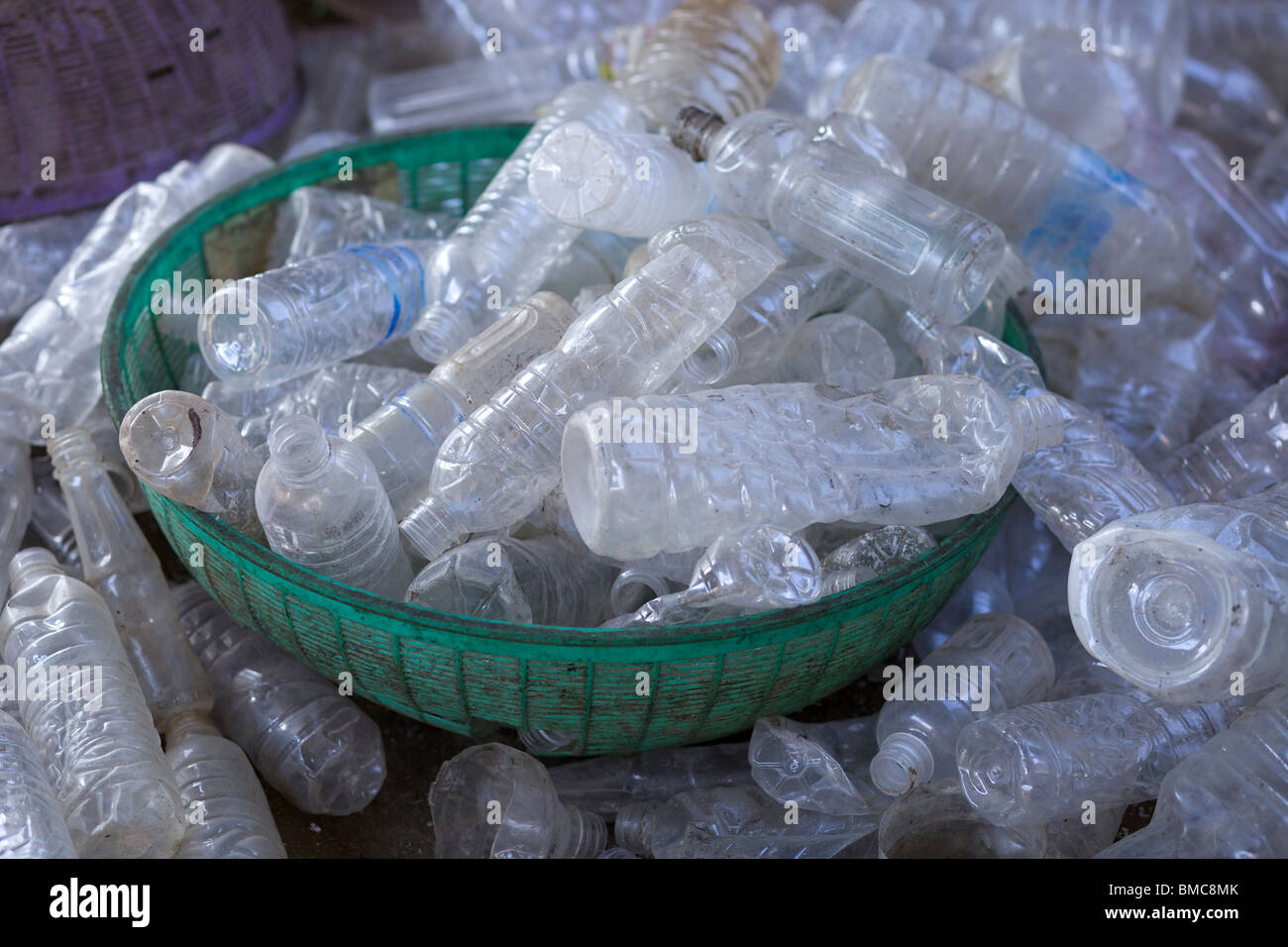 Plastic bottle waste collected on a recycling plant for pet chips Stock ...