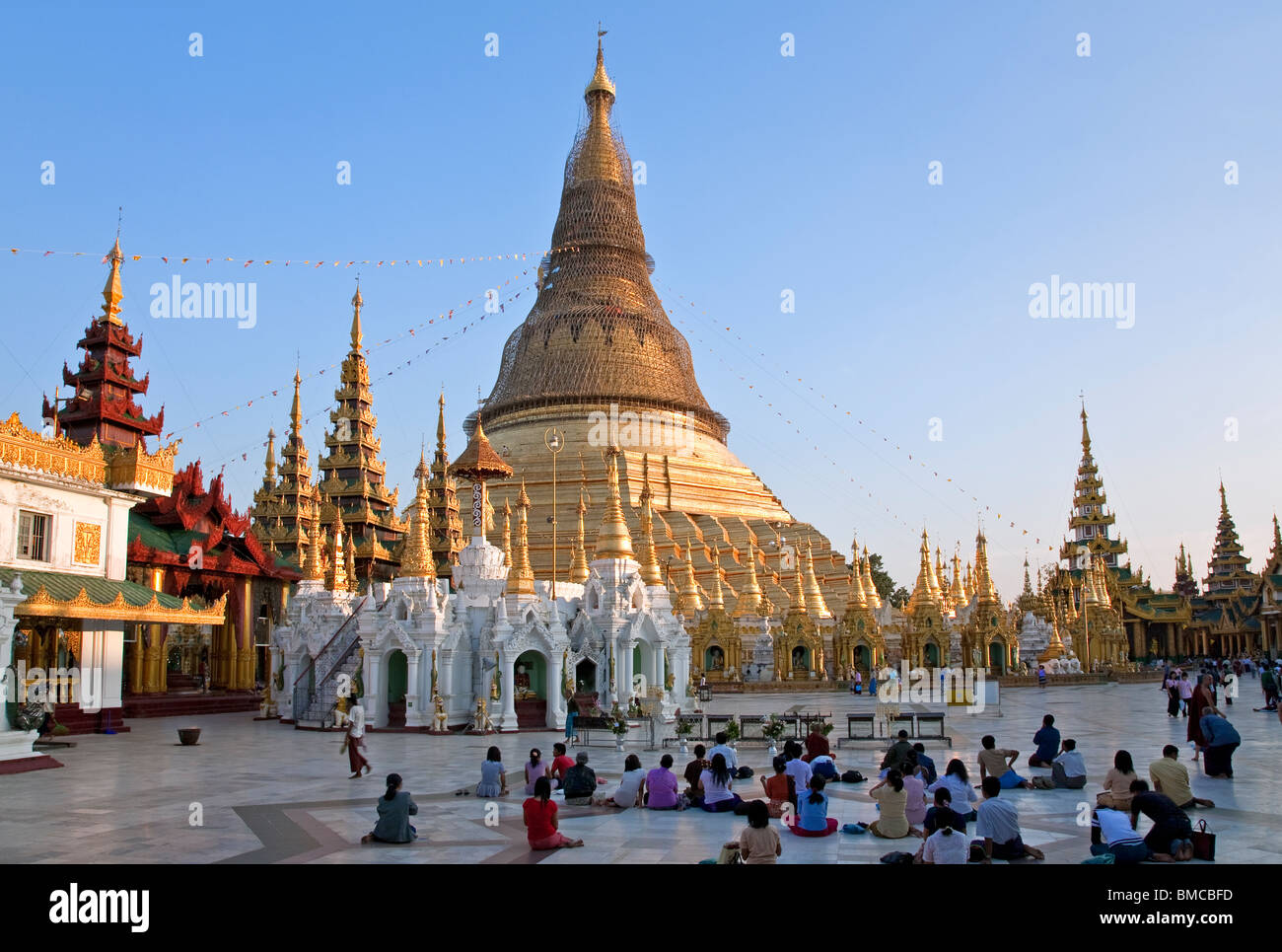 Burmese devotees praying. Shwedagon Paya. Yangon. Myanmar Stock Photo ...