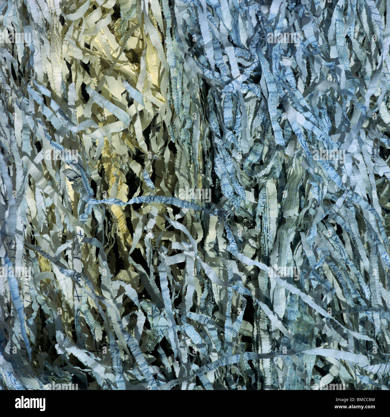 Colorful abstract arrangement of shredded paper strips creating a ...