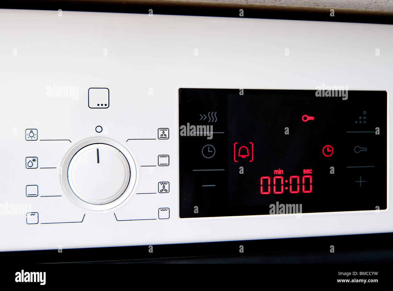 Modern kitchen stove control panel Stock Photo - Alamy
