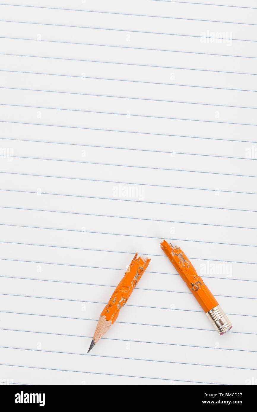 Broken Pencil and notepad, concept of frustration Stock Photo - Alamy