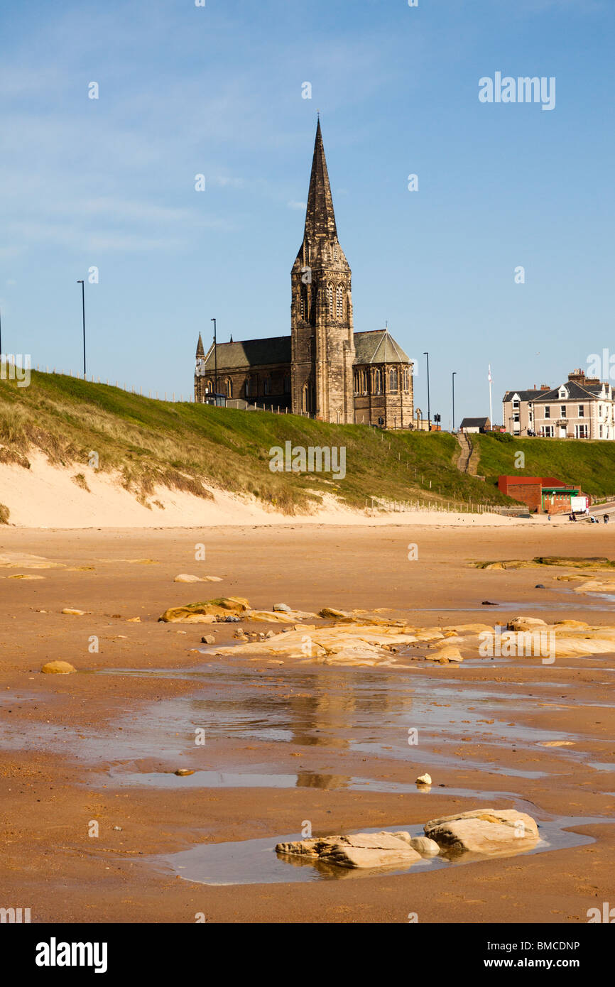 St Georges church overlooking Tynemouth beach on the north east coast ...