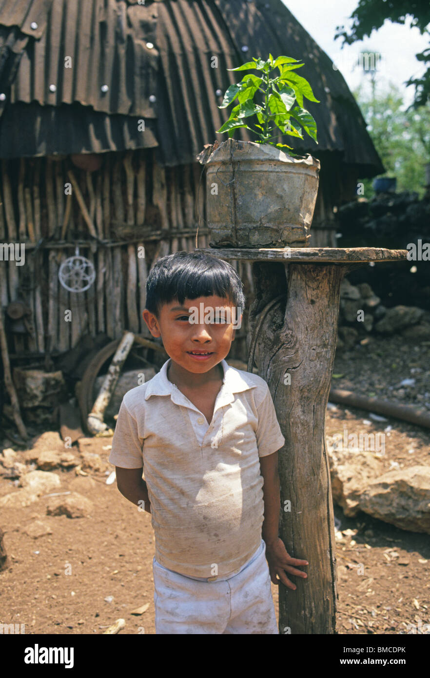 A Mayan boy, descendant of the Maya People, in a tiny remote village in ...