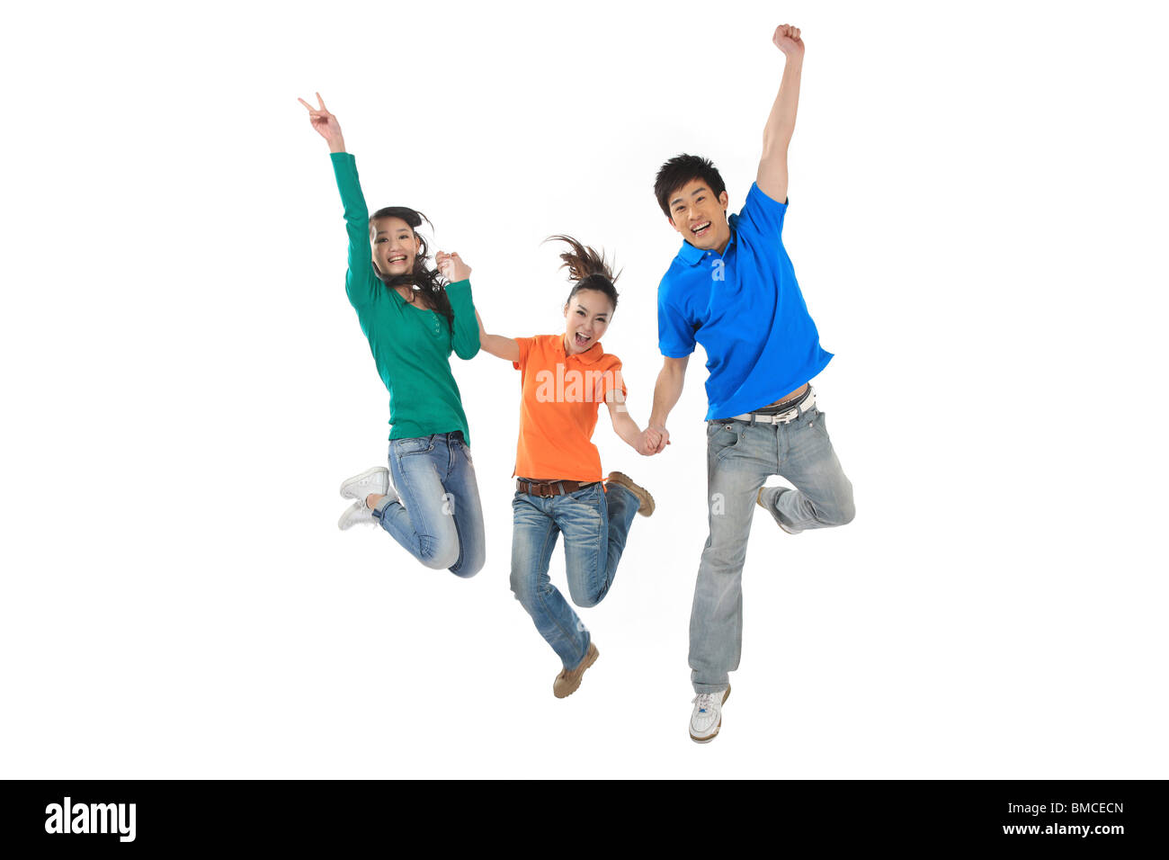 Man and women jumping for joy Stock Photo - Alamy