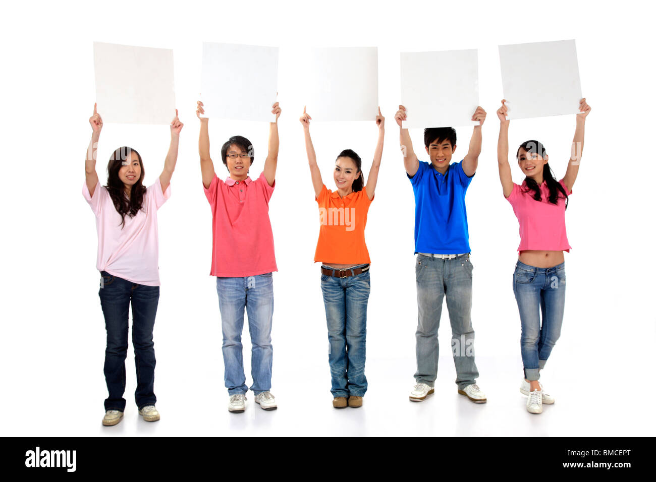 Group women holding sign Cut Out Stock Images & Pictures - Alamy