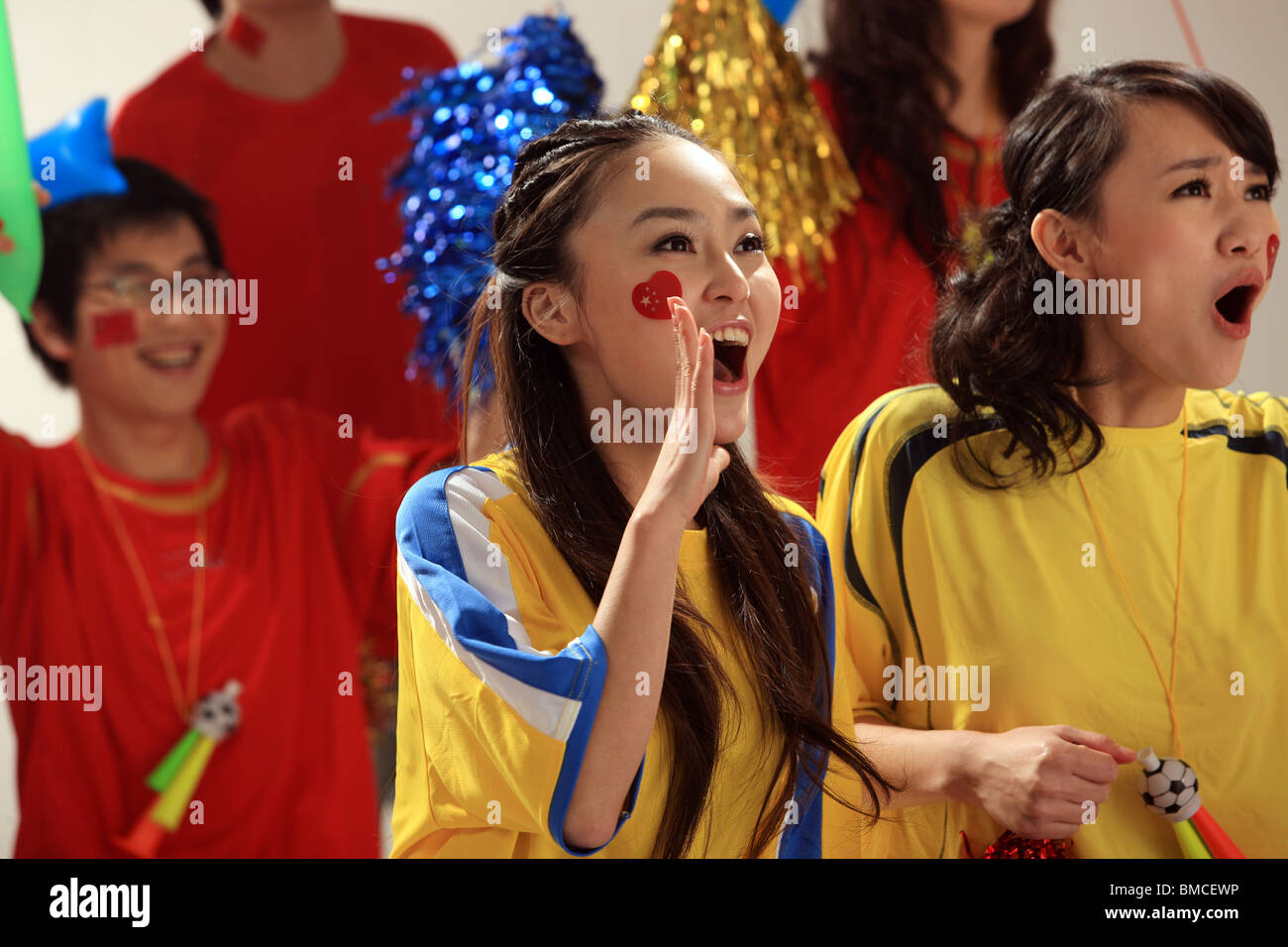 Chinese soccer fans Stock Photo - Alamy