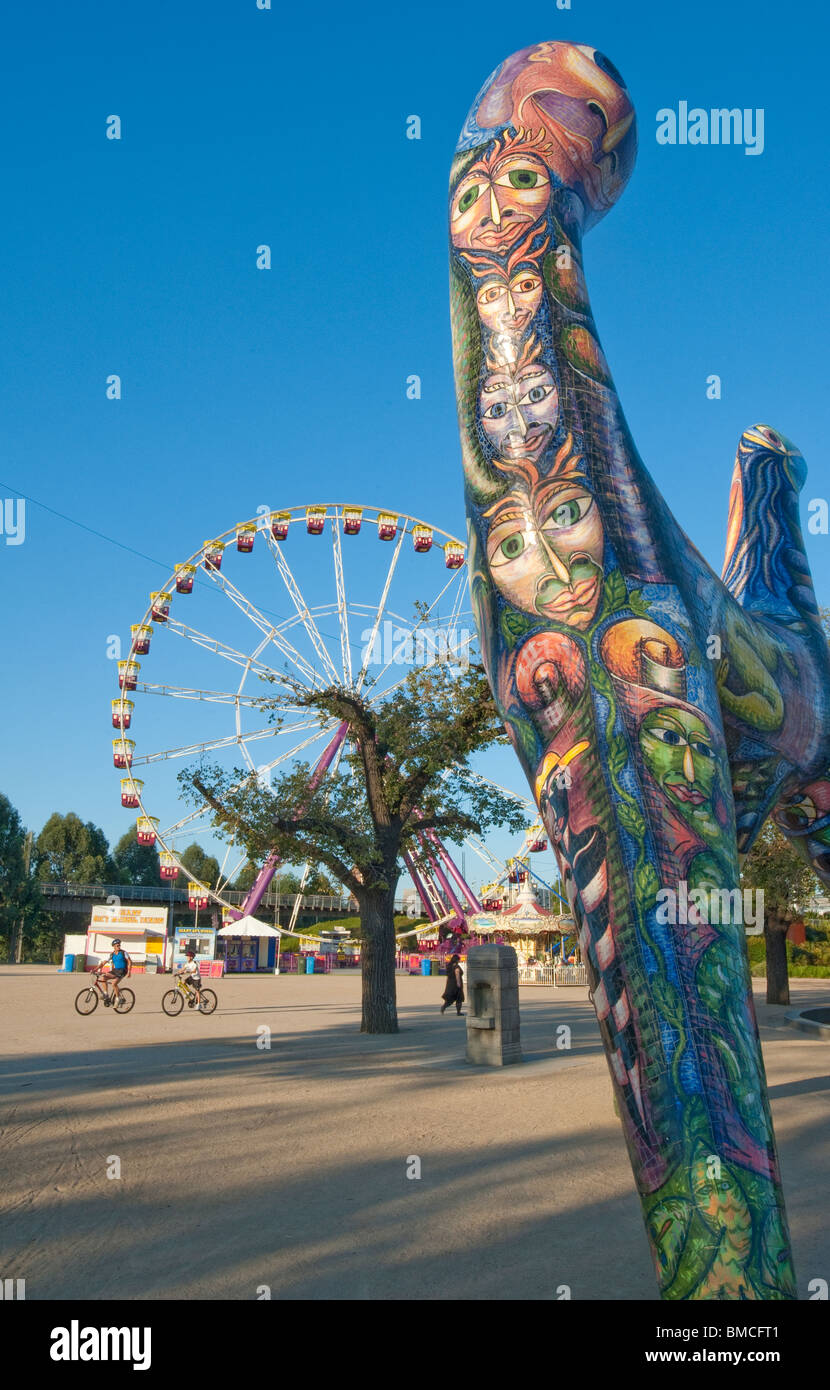 Ferris Wheel and Angel sculpture by Deborah Halpern on the banks of the ...