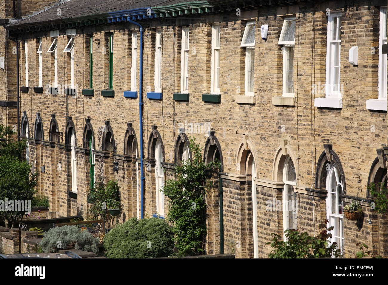 A row of terraced houses in Sir Titus Salt's model village Saltaire ...