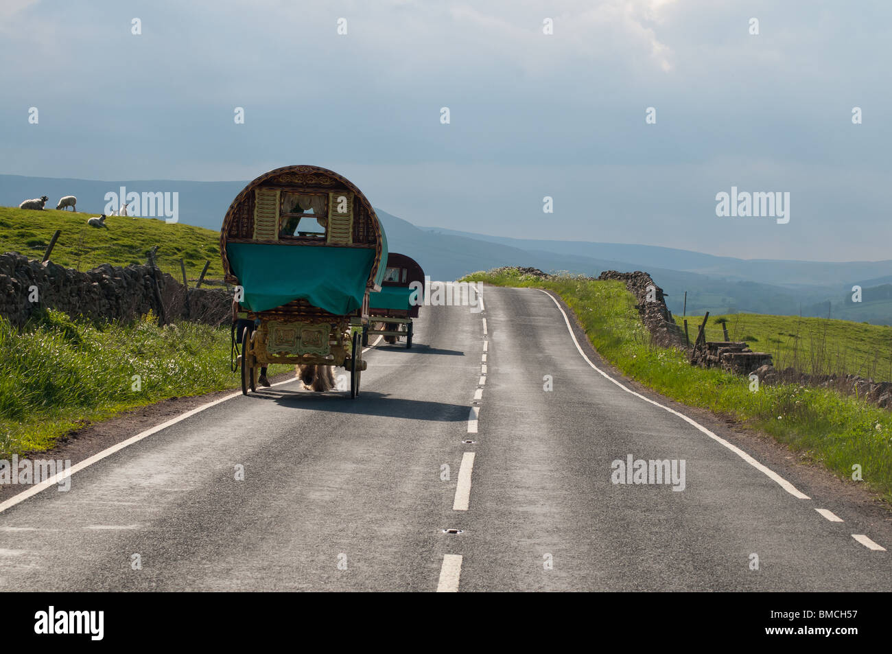 Bow wagons on the road near Hawes, North Yorkshire Dales Stock Photo ...