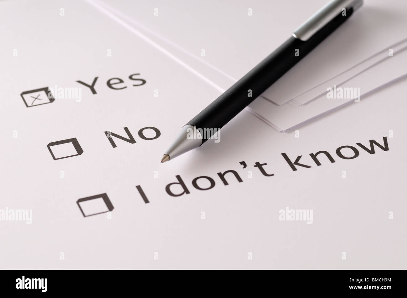 Pen with Questionnaire Stock Photo - Alamy