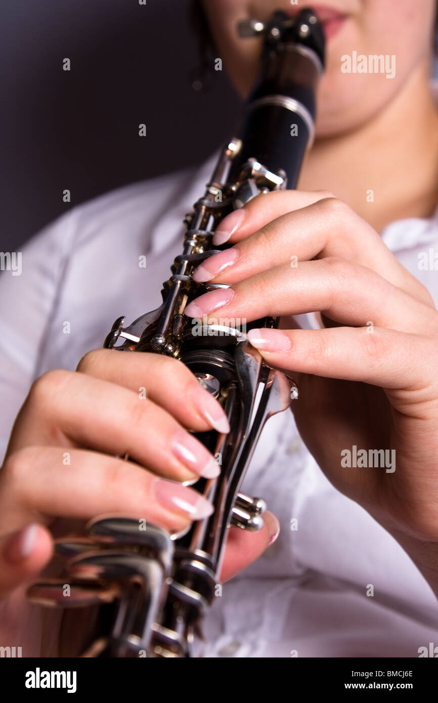Girl playing musical instrument Stock Photo - Alamy
