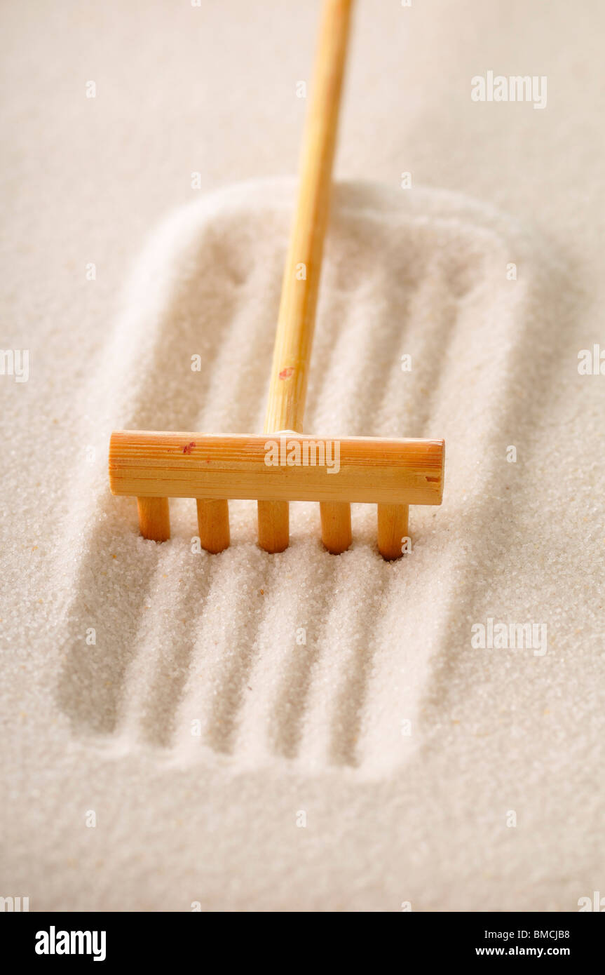 Rake in Zen Garden Stock Photo - Alamy