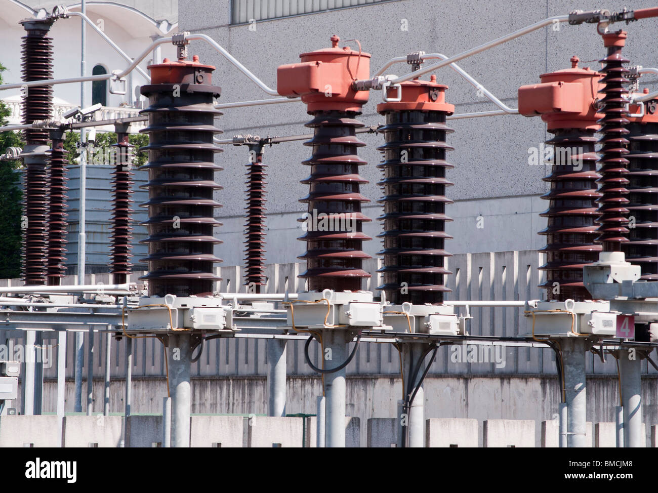 High Voltage Bobbins of power plant station Stock Photo - Alamy