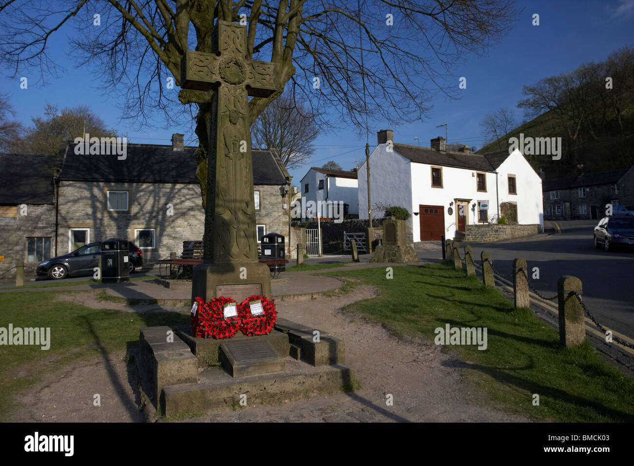 celtic cross war memorial in market place in the peak district village ...