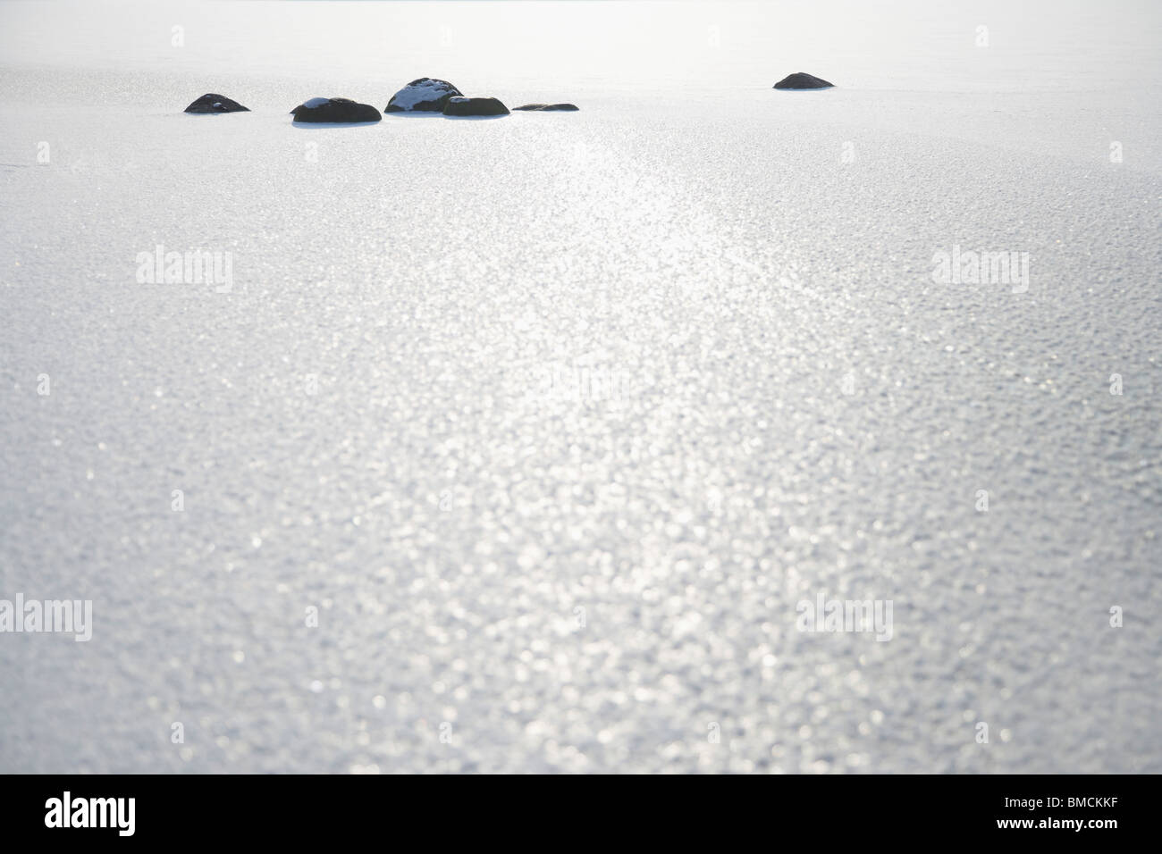 Sun reflecting on frozen lake hi-res stock photography and images - Alamy