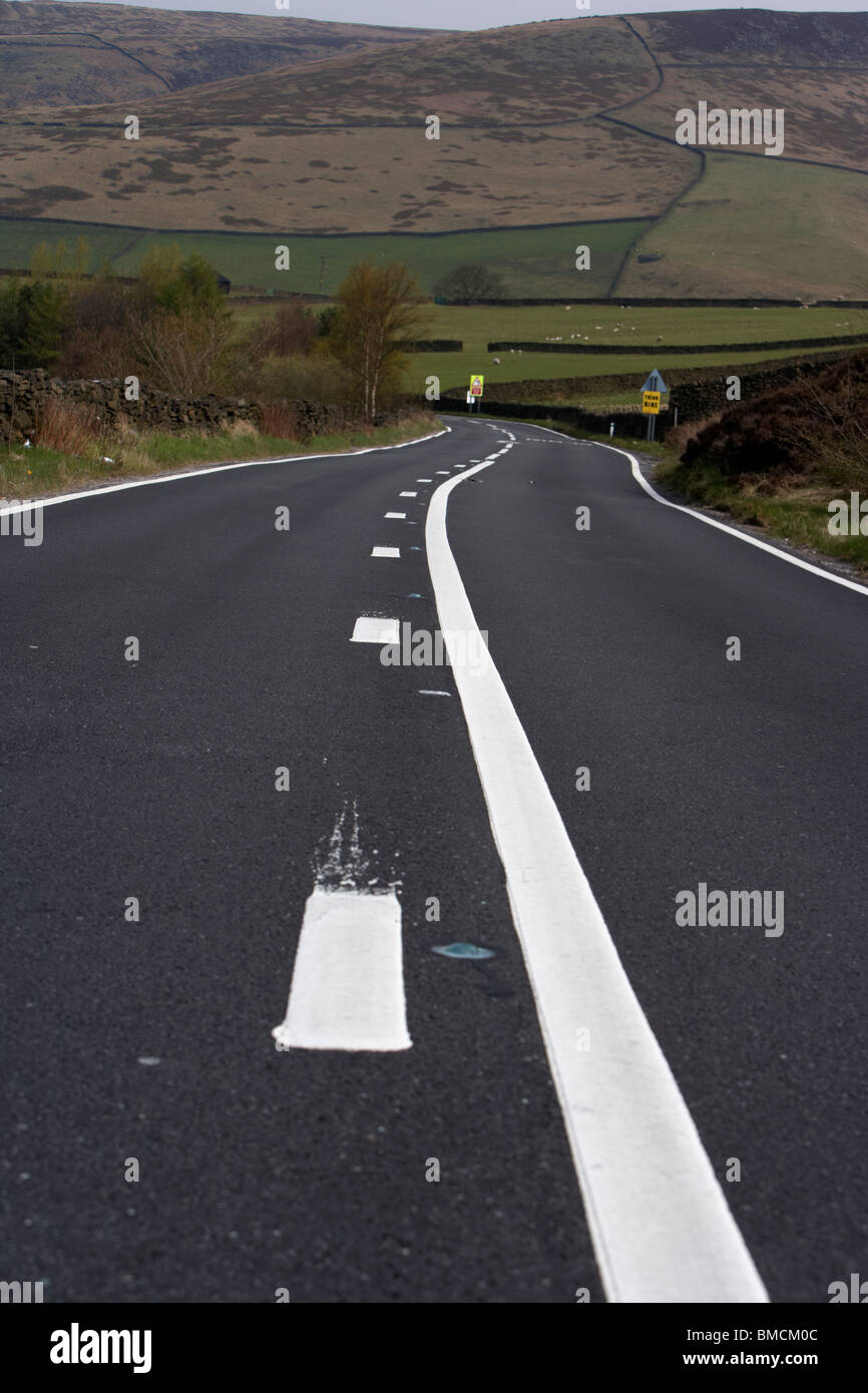 freshly painted road markings on the a57 road rising from glossop ...