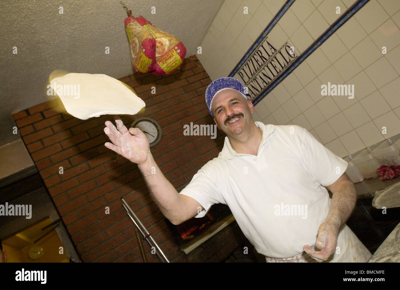 Chef throwing pizza's in Santaniello's, an Italian Restaurant in ...