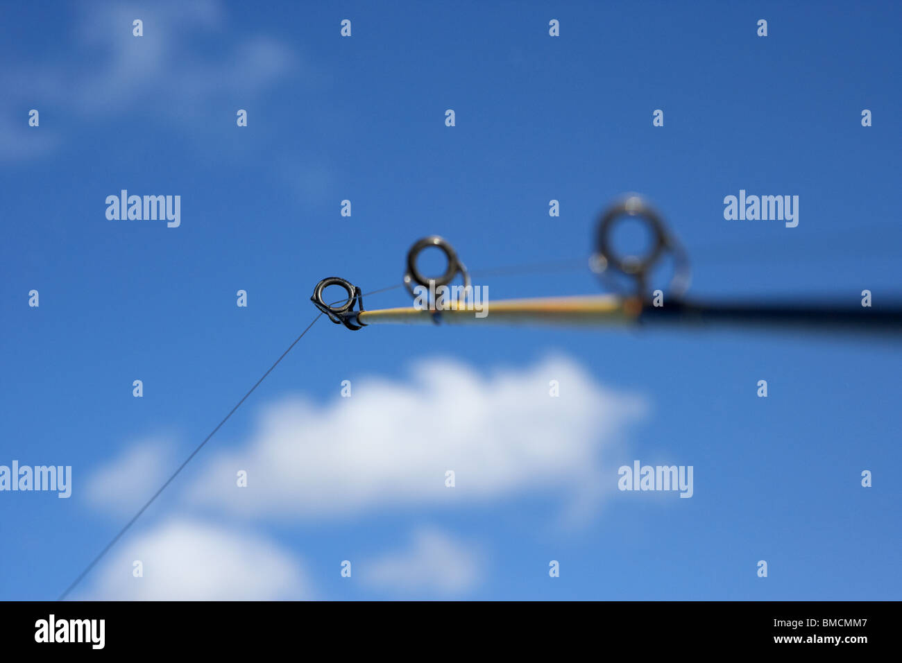 rod and line fishing against blue sky Stock Photo - Alamy