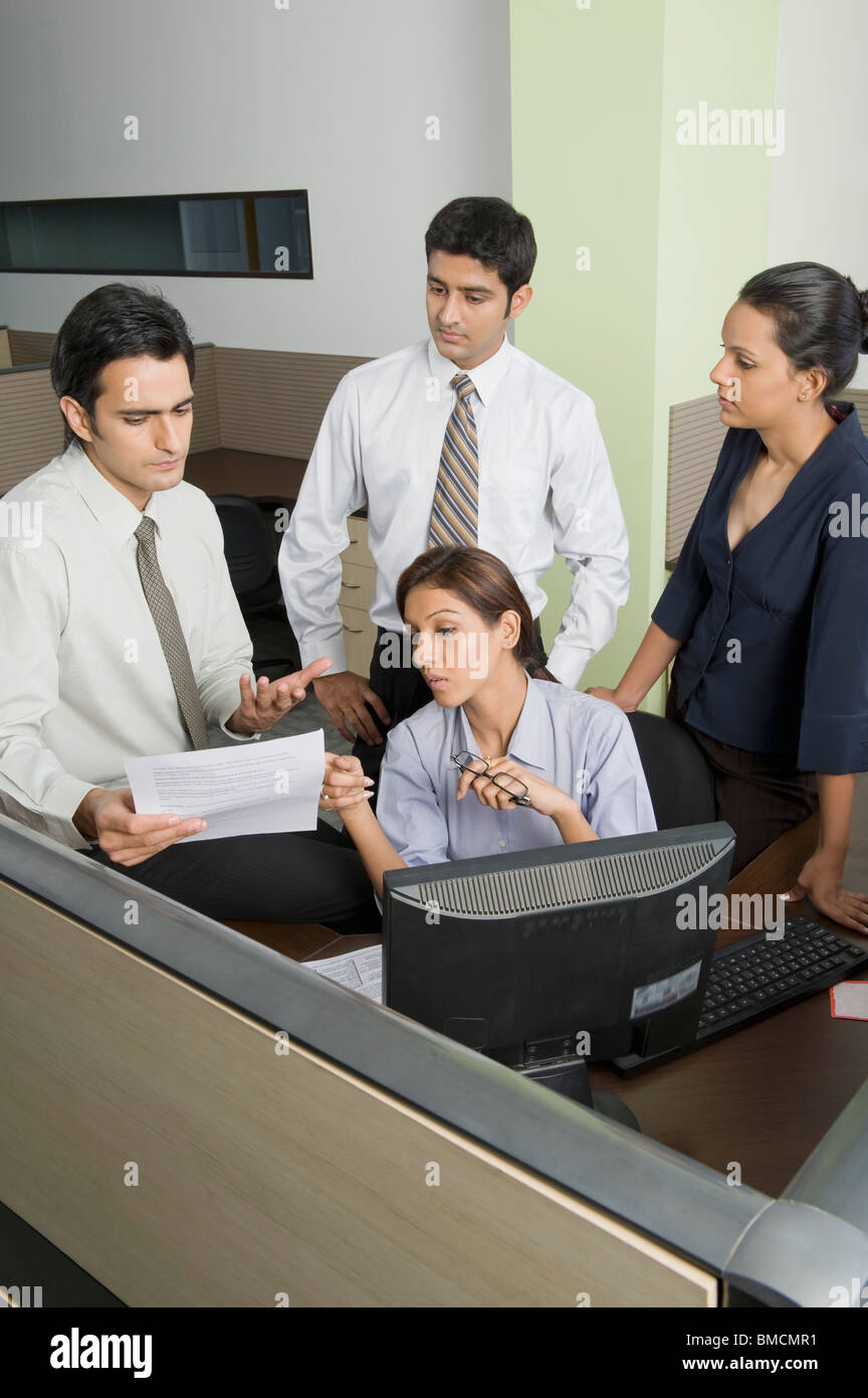 Executives discussing colleagues planning hi-res stock photography and ...