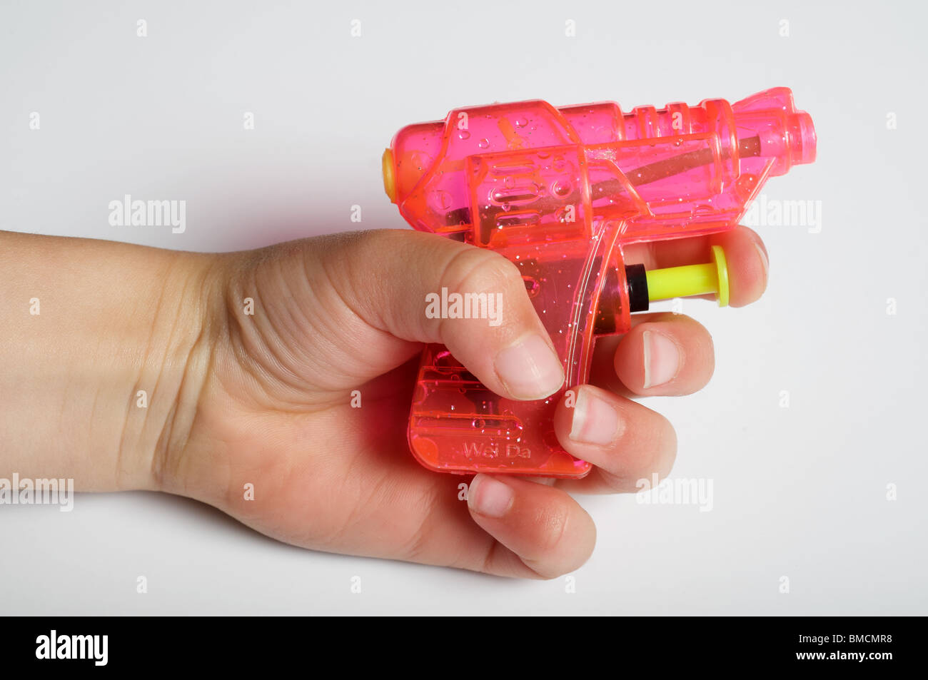 Pink water gun shooting hi-res stock photography and images - Alamy