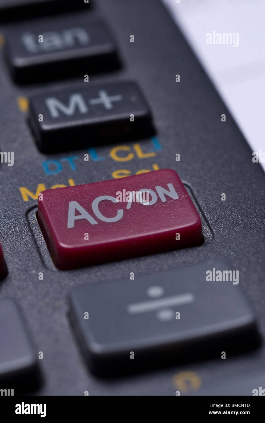calculator on button Stock Photo - Alamy