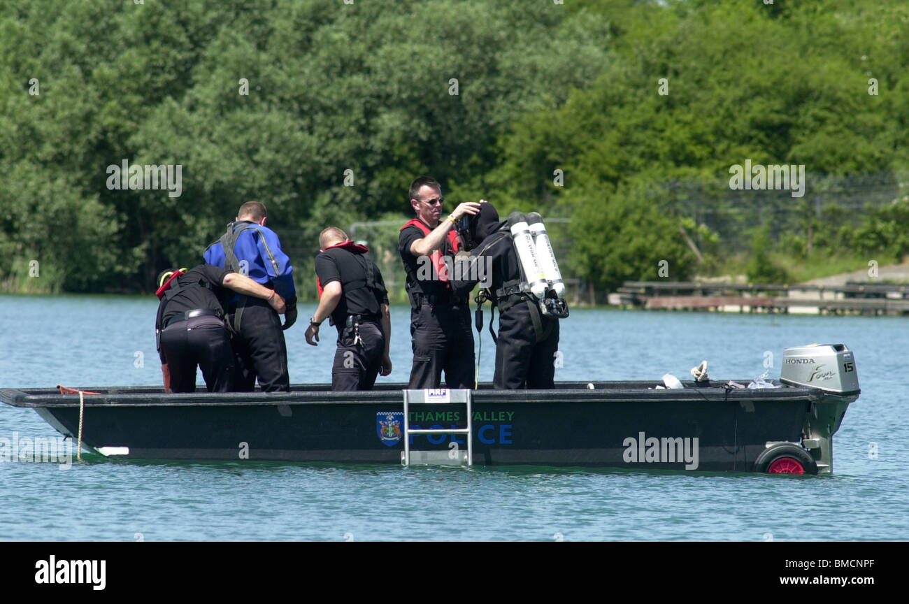 A Thames Valley Police dive team searches for a drowned man at the ...