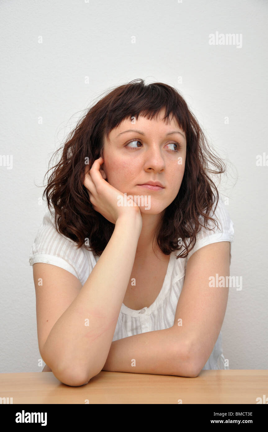 Young woman being bored Stock Photo - Alamy