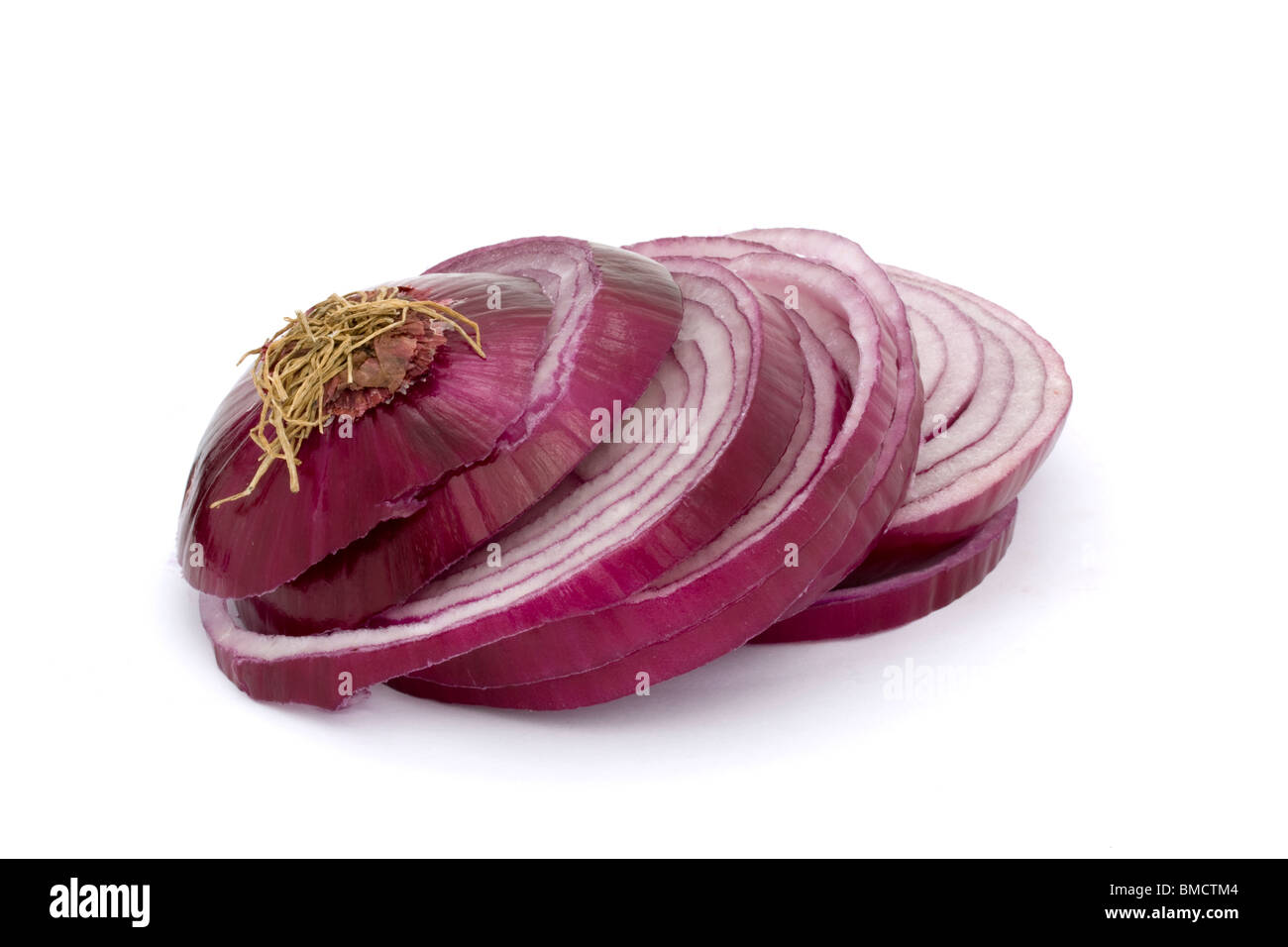 sliced red onion on a white background Stock Photo - Alamy