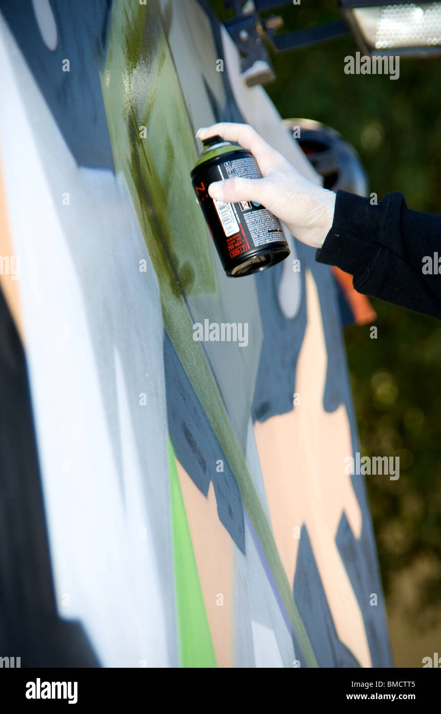 graffiti writer's spray at work Stock Photo - Alamy