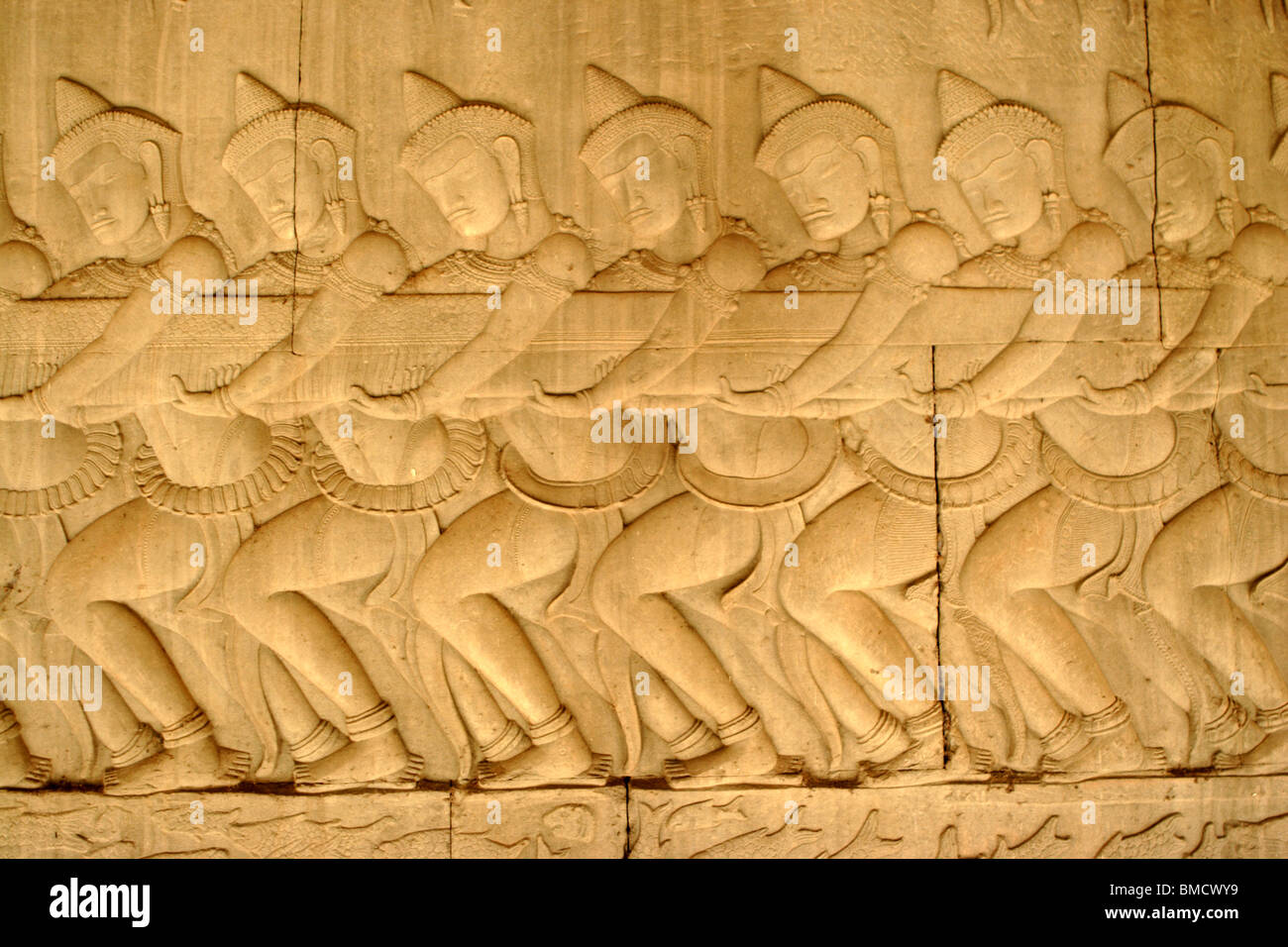 bas-reliefs depicting the churning of the sea of milk from Hindu myth ...