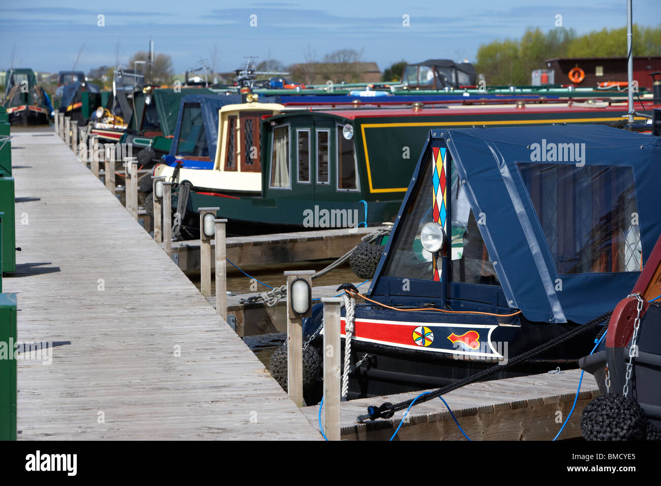traditional english narrow and wide canal boats moored at scarisbrick ...