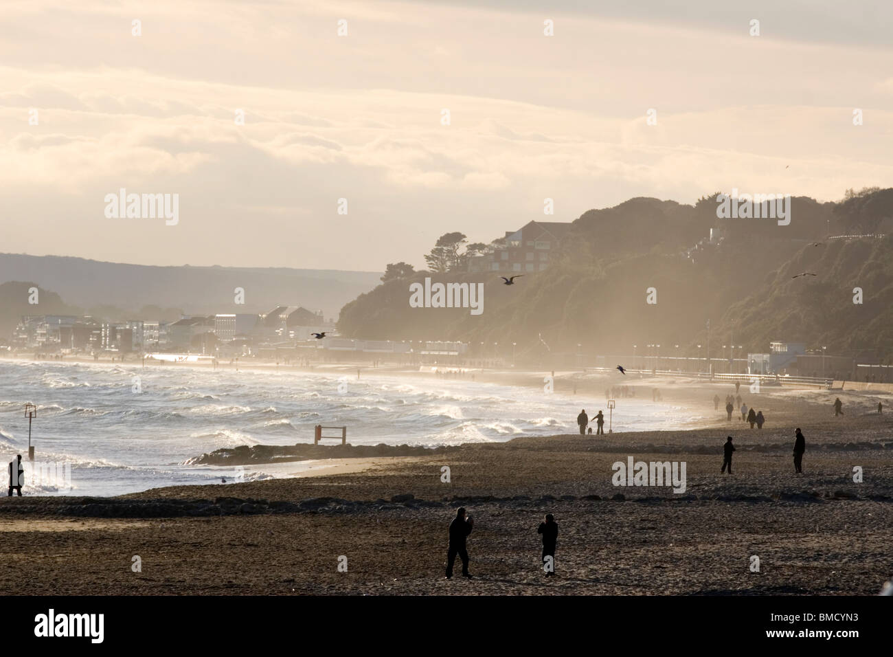 Winter day on the beach at Canford Cliffs with Sandbanks in the ...