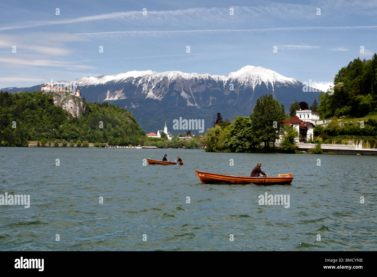Traditional 'pletna' rowing boats on Lake Bled, Slovenia Stock Photo ...