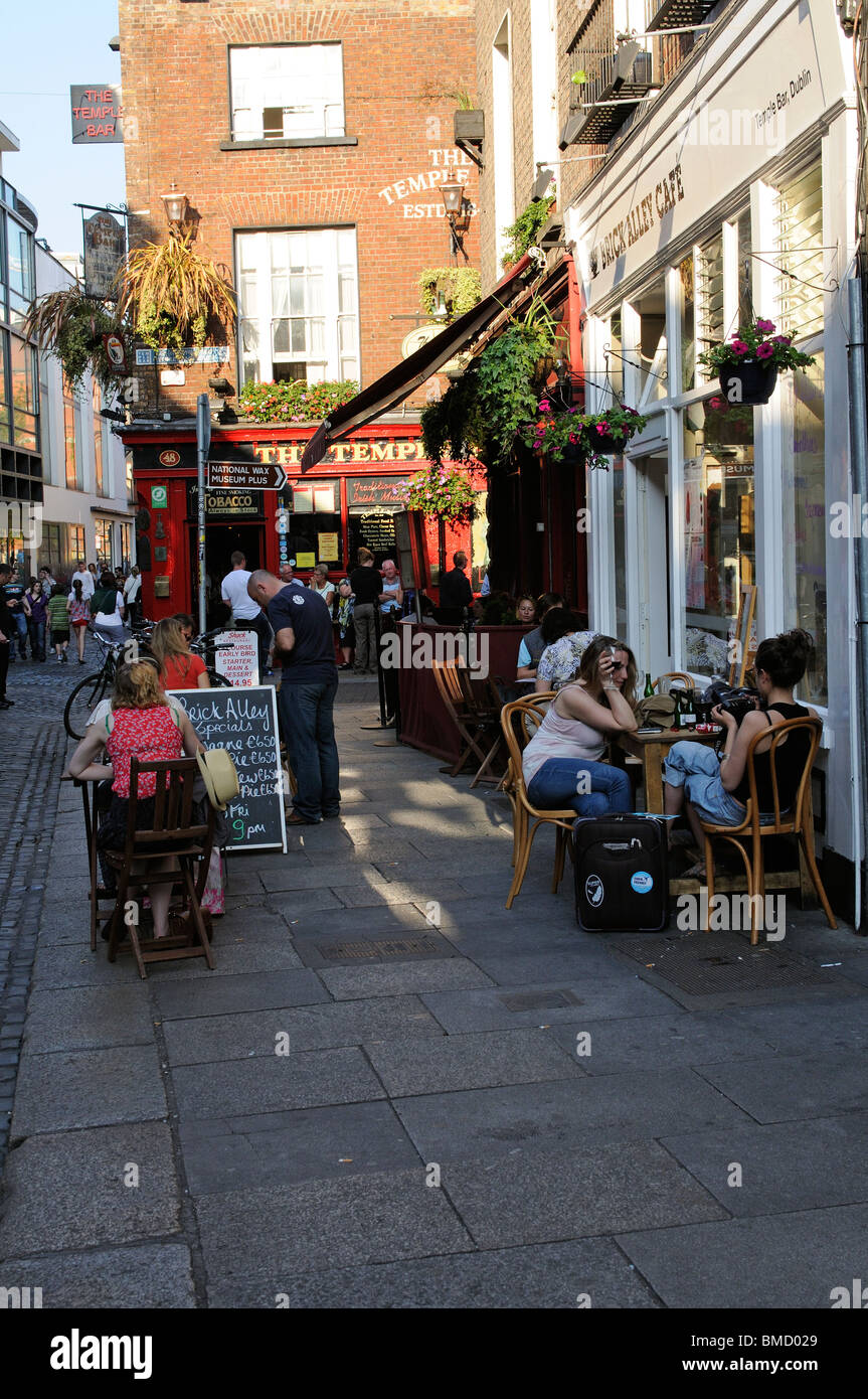 Customers outside the Temple Bar pub & Brick Alley cafe in the Temple ...