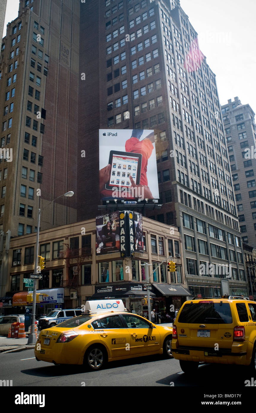 Advertising for the Apple Inc. iPad on a billboard in Midtown Manhattan ...