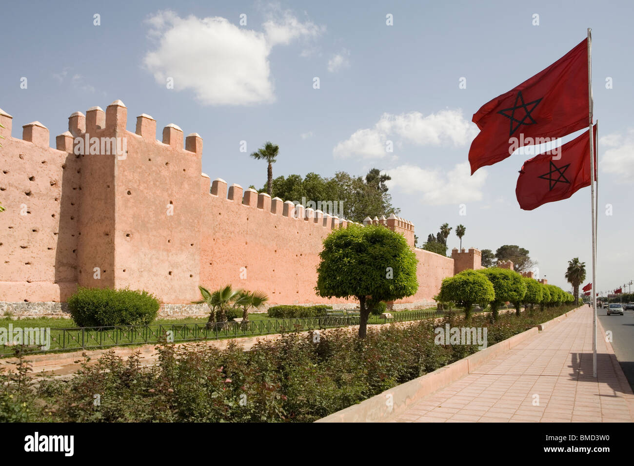Pink City Walls and flying flags , Marrakesh , Morocco , North Africa ...