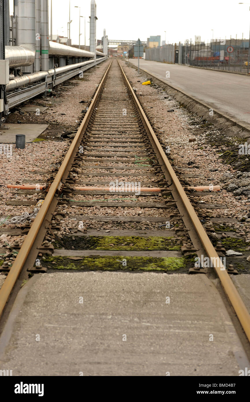 Railway track at dock / port Stock Photo - Alamy