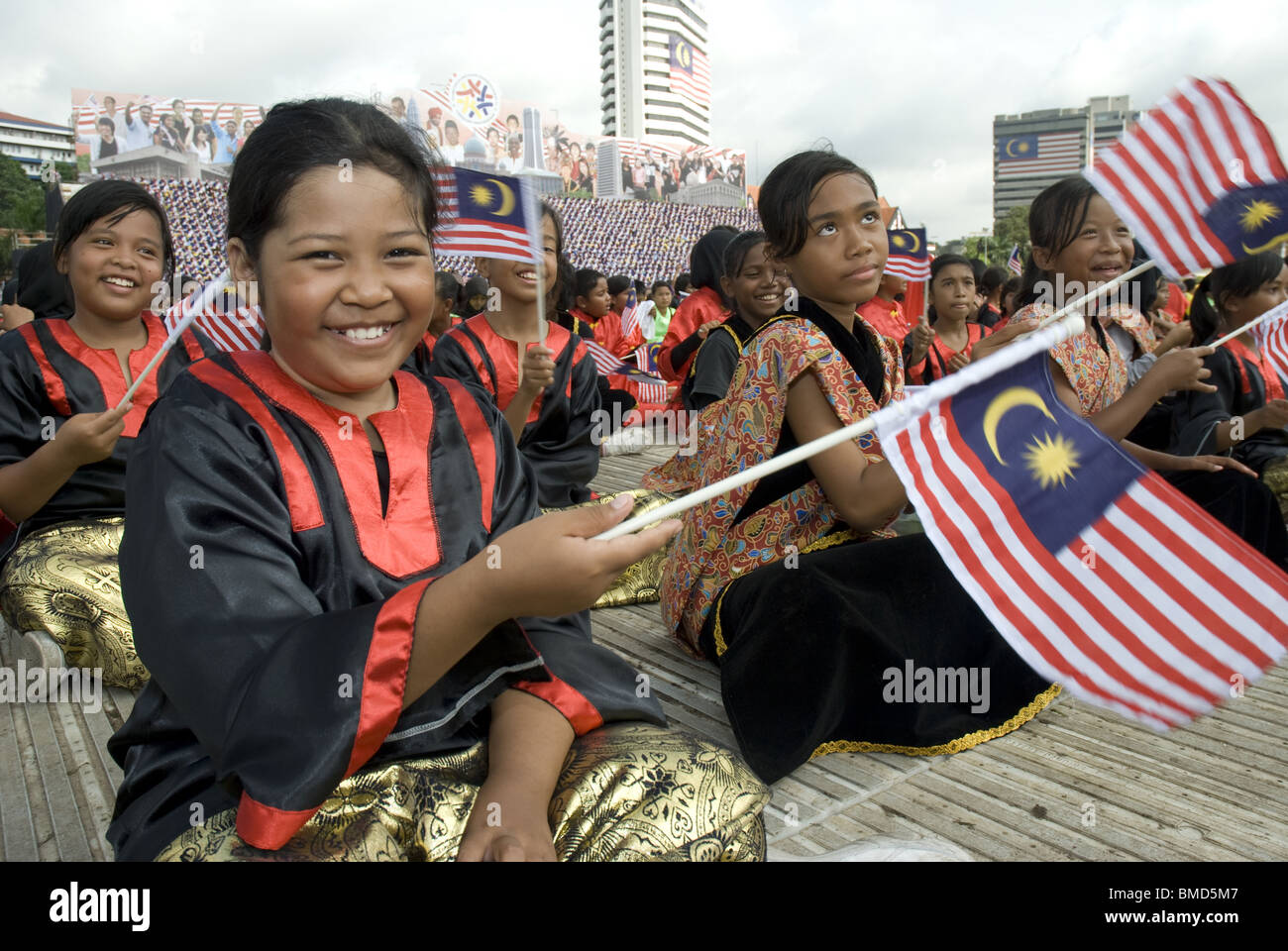 Young performers waving the Malaysian flag, Merdeka Square, Kuala ...