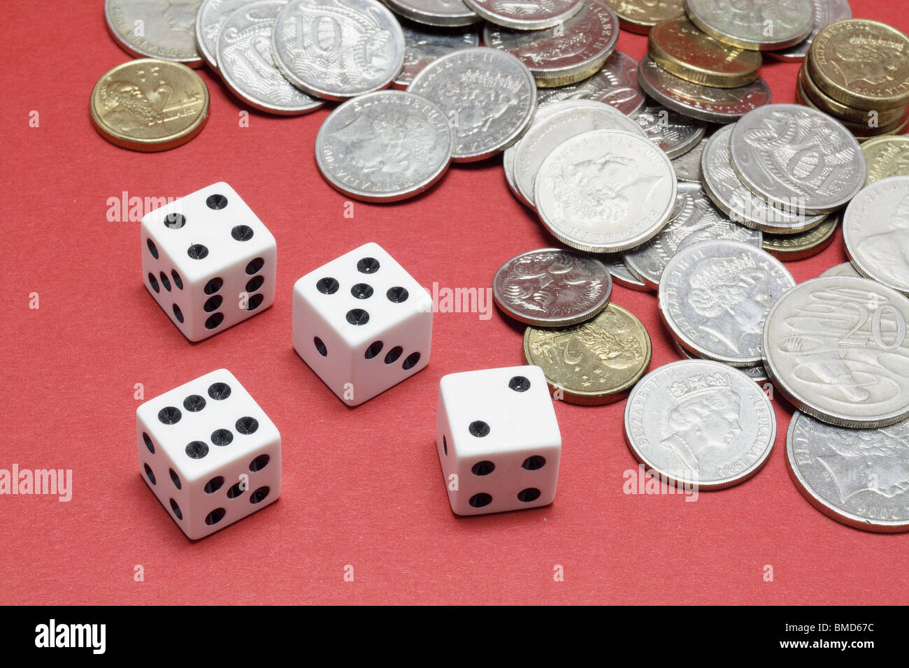 Dice and Coins Stock Photo - Alamy